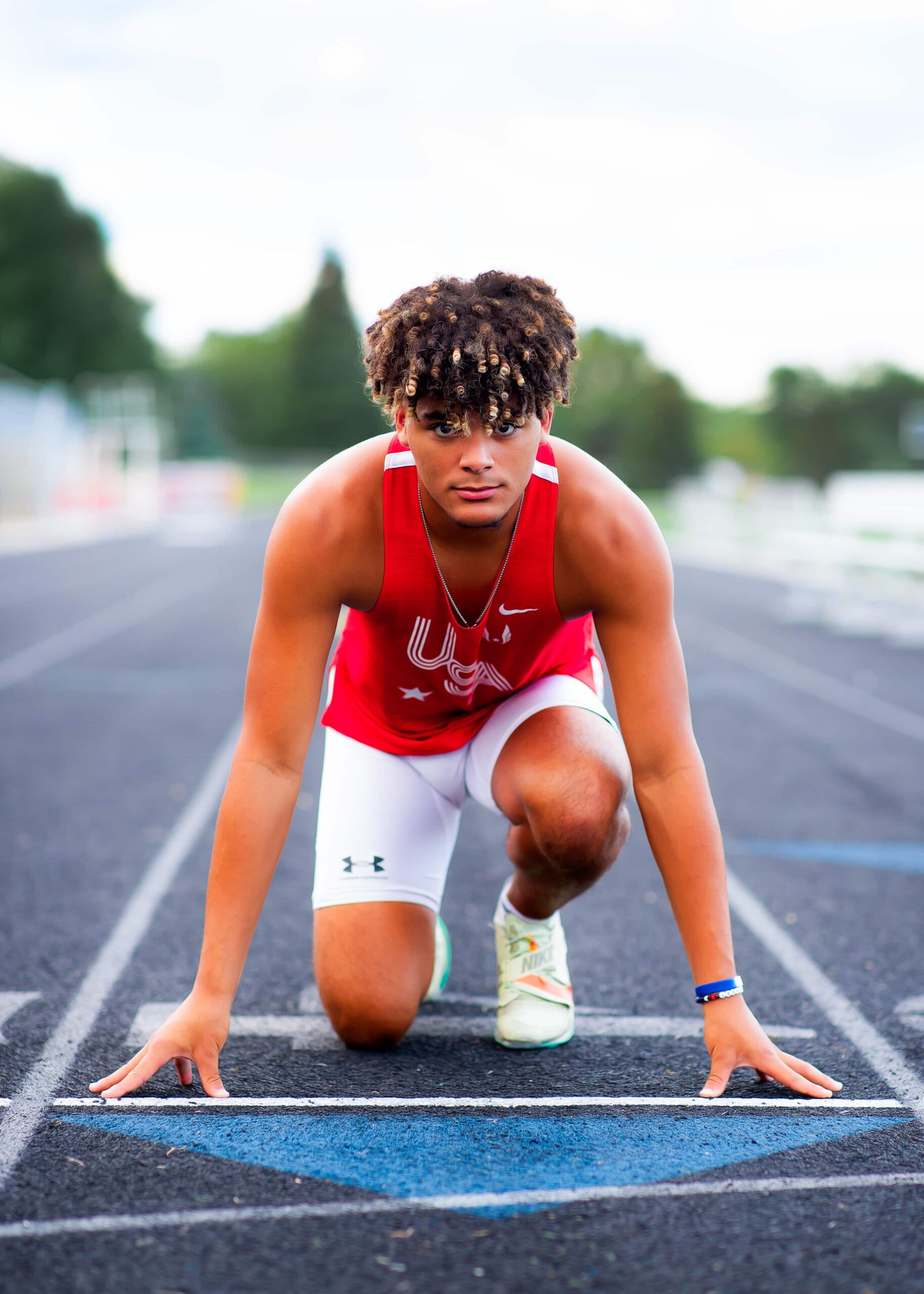 Track and Field Jumping Senior Pictures - Amanda Palmer Photography